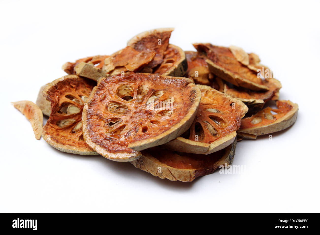 Dried bael fruit Stock Photo - Alamy