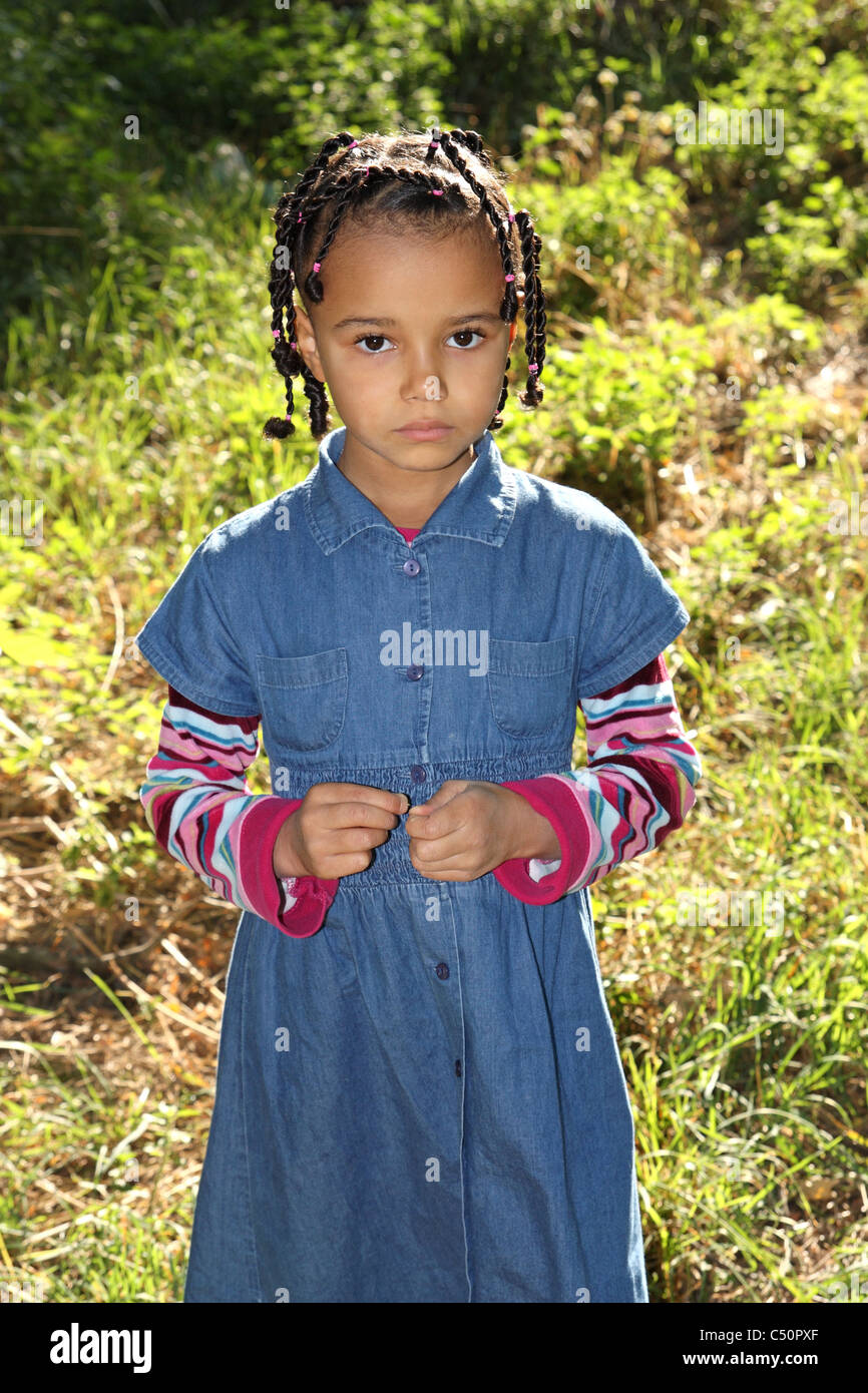 Little dark-skinned girl with tears in his eyes outdoors Stock Photo ... Little dark-skinned girl with tears in his eyes outdoors Stock Photo ...