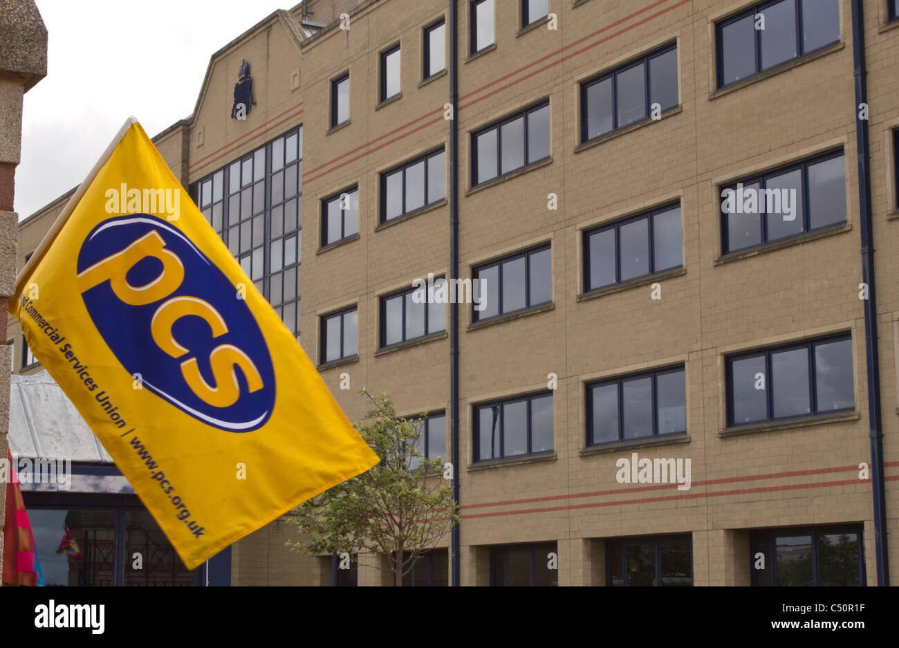 PCS flag on a picket line, at HMRC, Queen's Dock, Liverpool Stock Photo ...