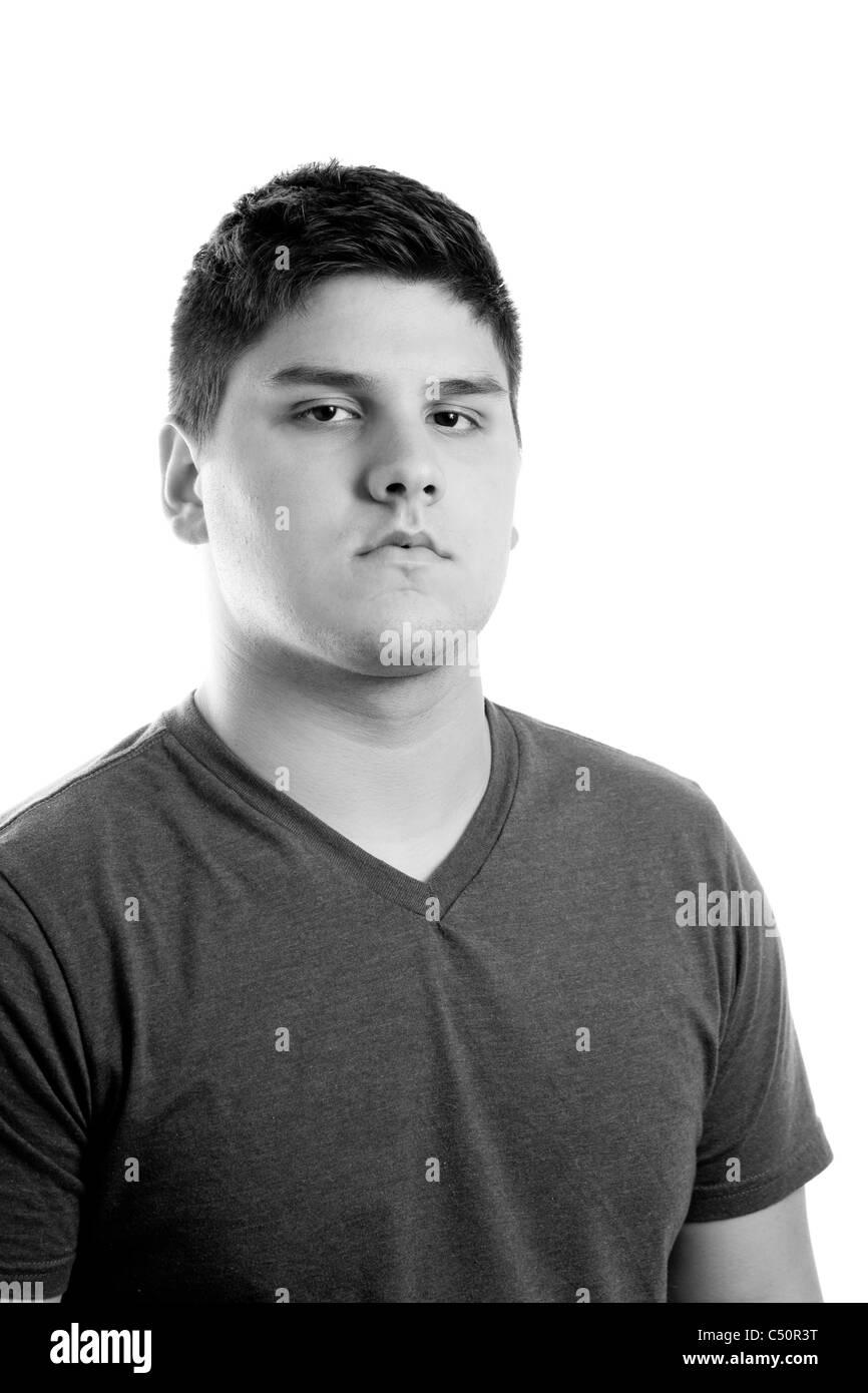 A close up of a young man with a very serious look on his face Stock ...