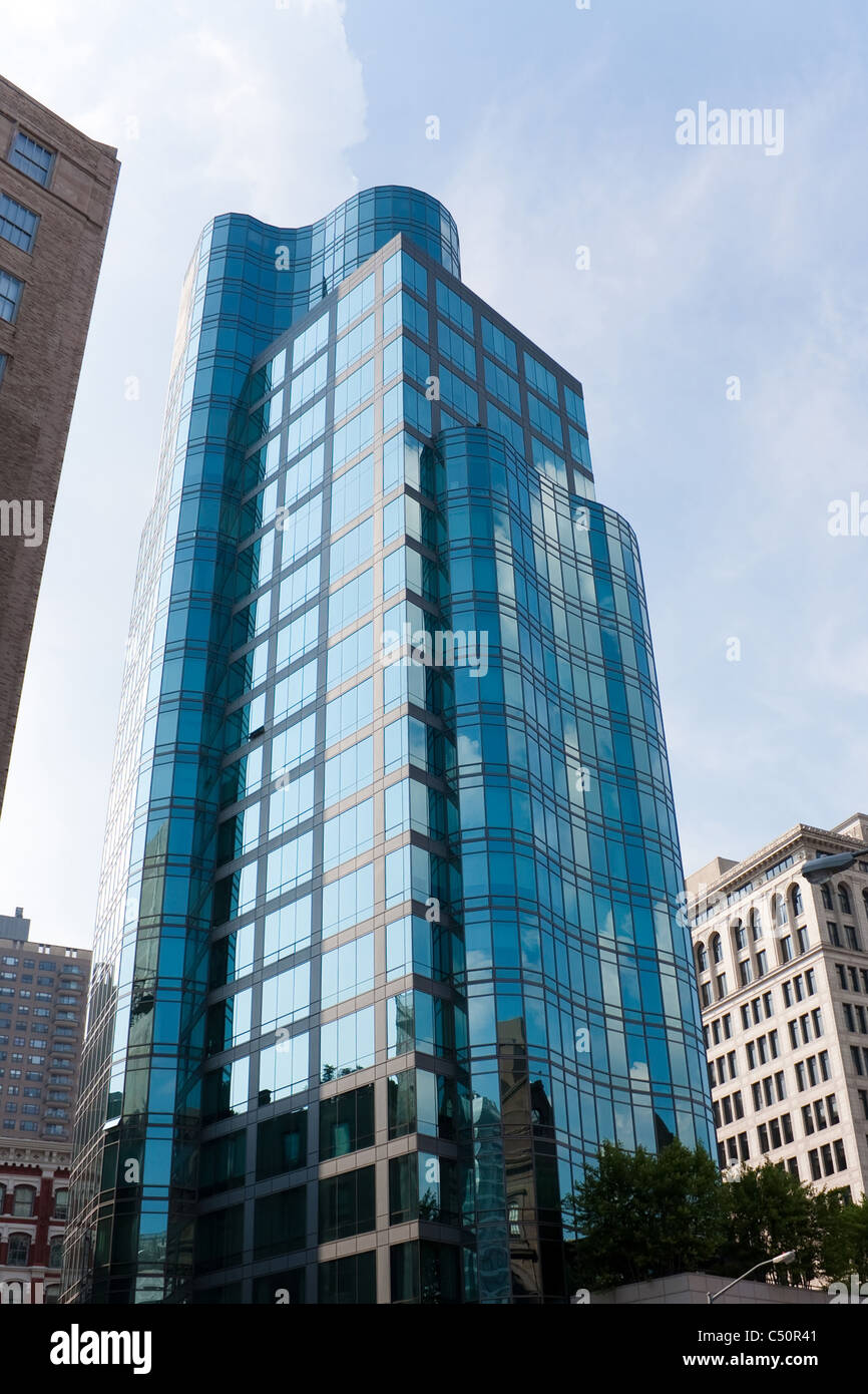 City architecture with lots of windows towering high above street level ...