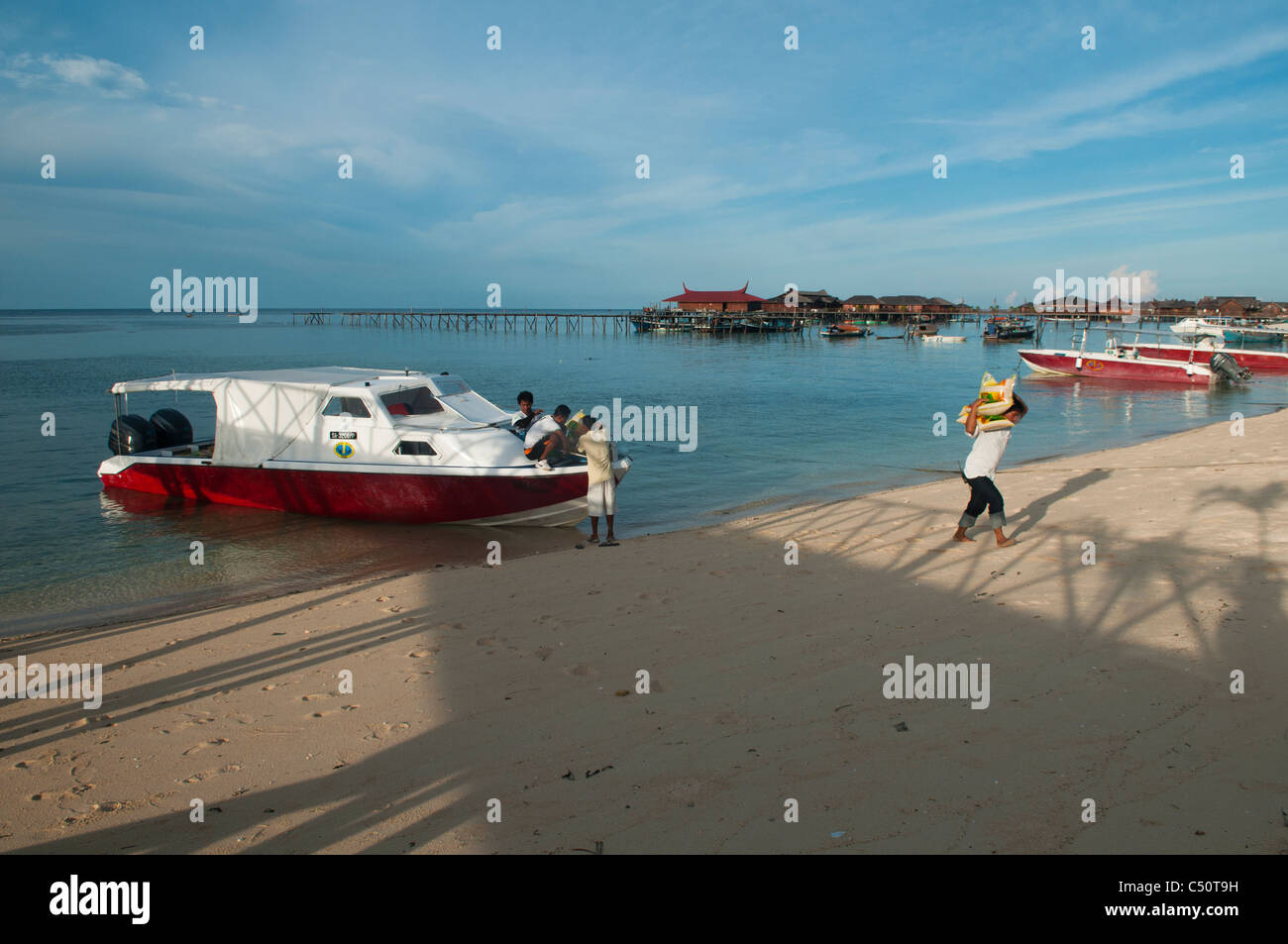 boats on the beach on Mabul Island, Borneo, Malaysia Stock Photo - Alamy