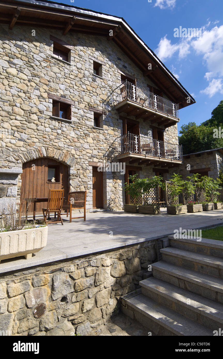 Typical house in the Pyrenees with cloud sky Stock Photo - Alamy