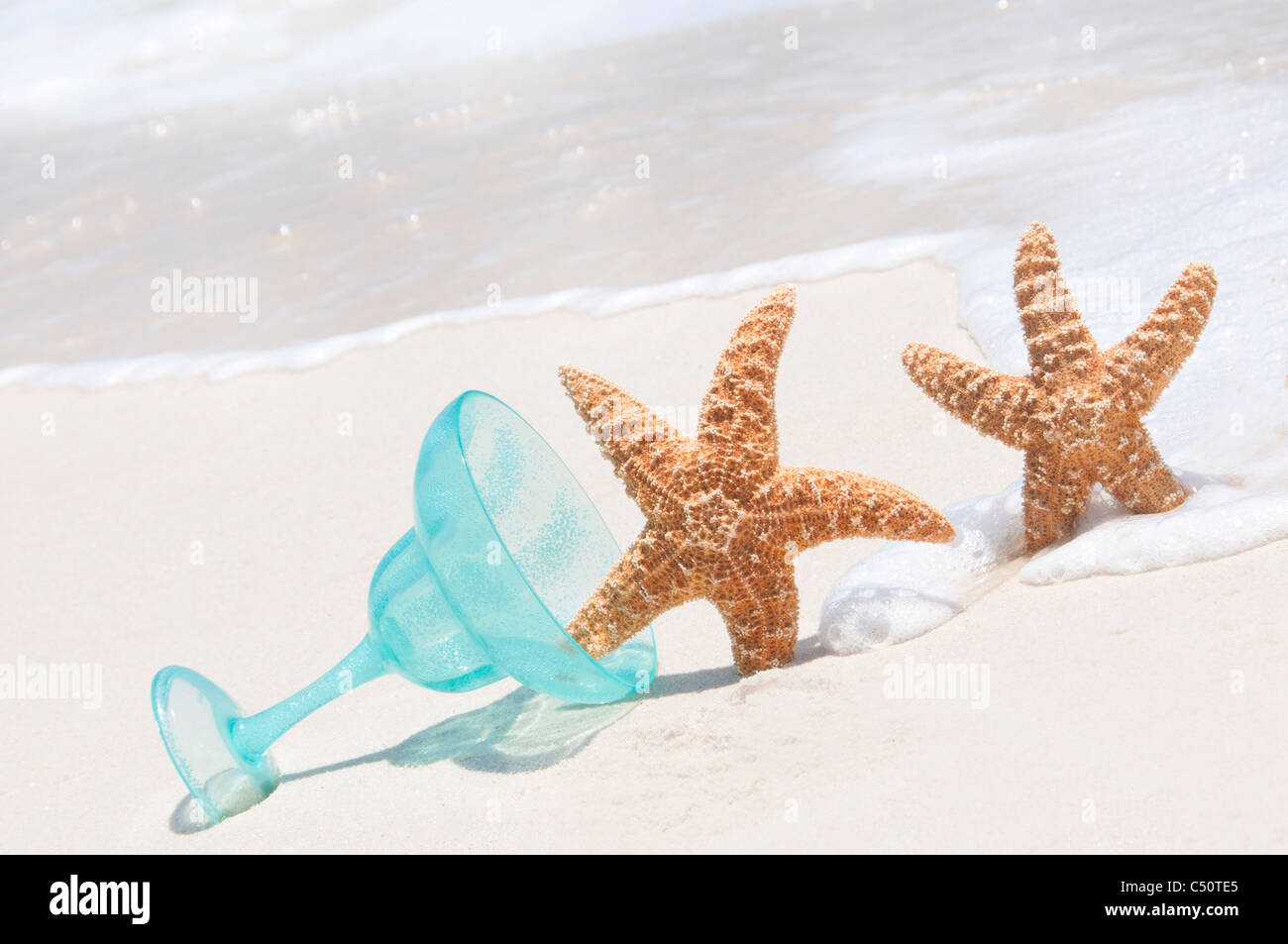 starfish falling down after drink on beach Stock Photo - Alamy