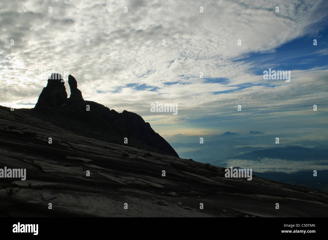 silhouette of Donkey Ears Peak on Mount Kinabalu in Sabah, Borneo ...