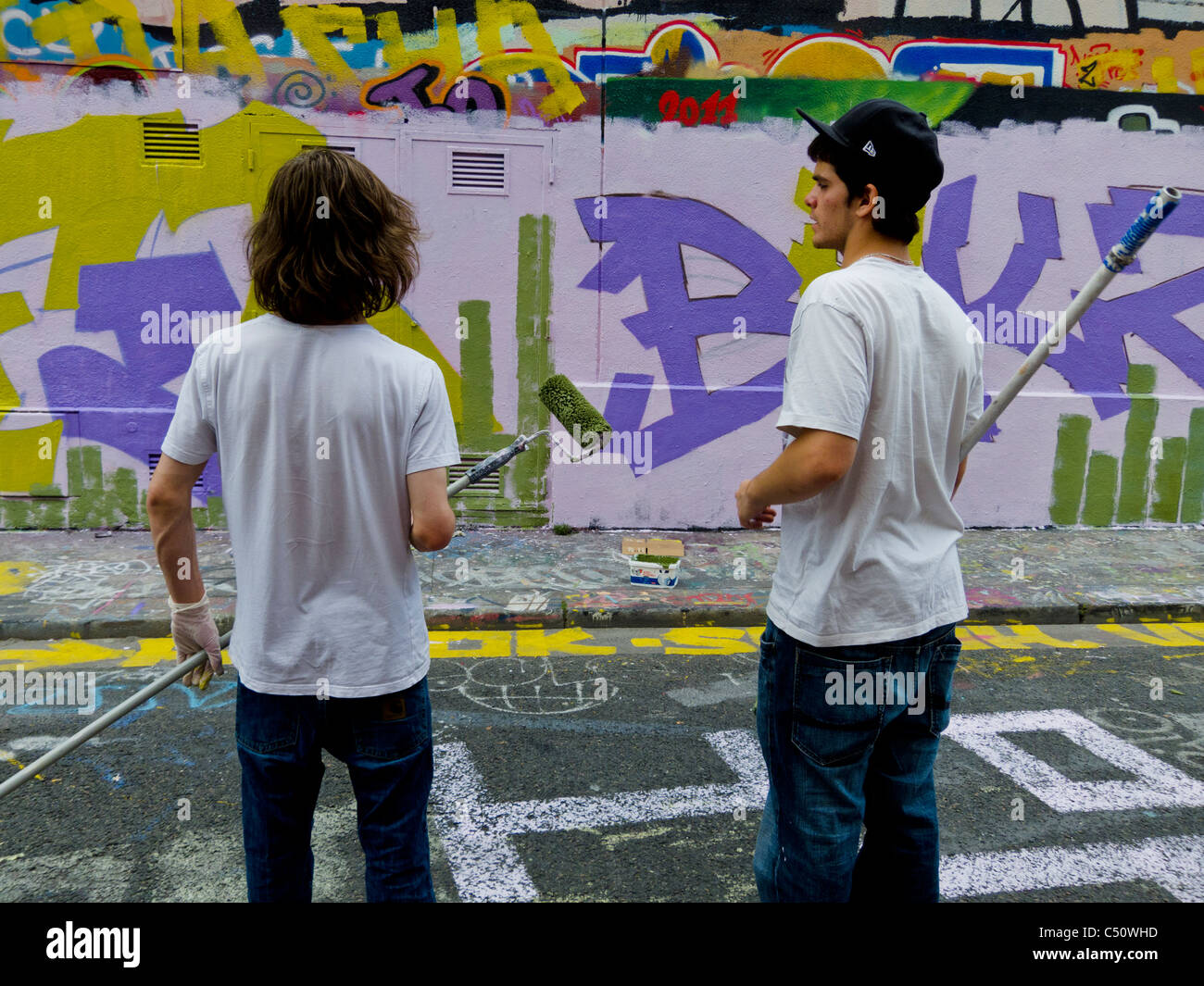 Paris, France, French Graffiti Artists Painting Wall, square, teenagers ...