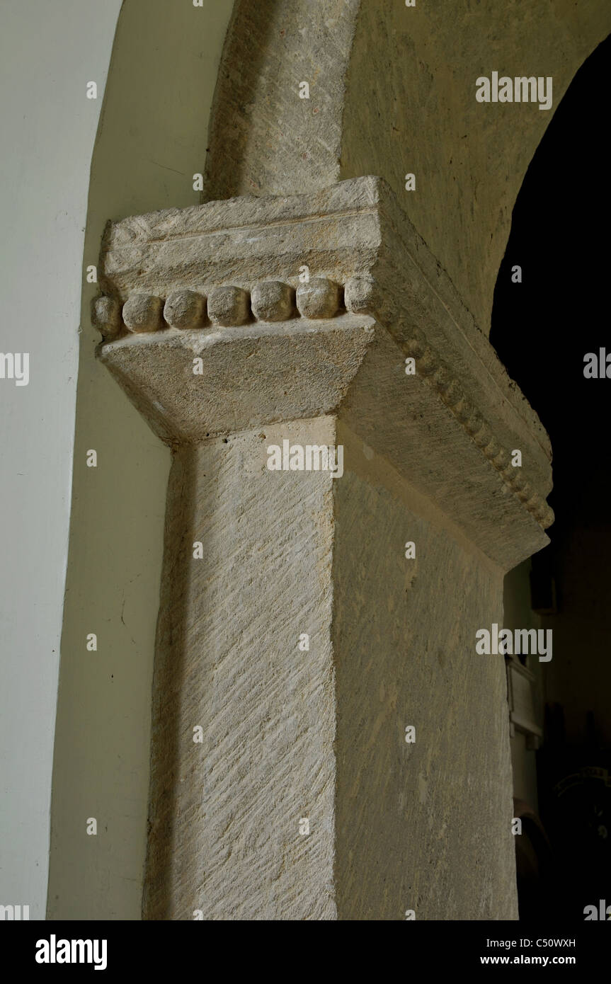 Carved capital in St. Andrew`s Church, Coln Rogers, Gloucestershire ...