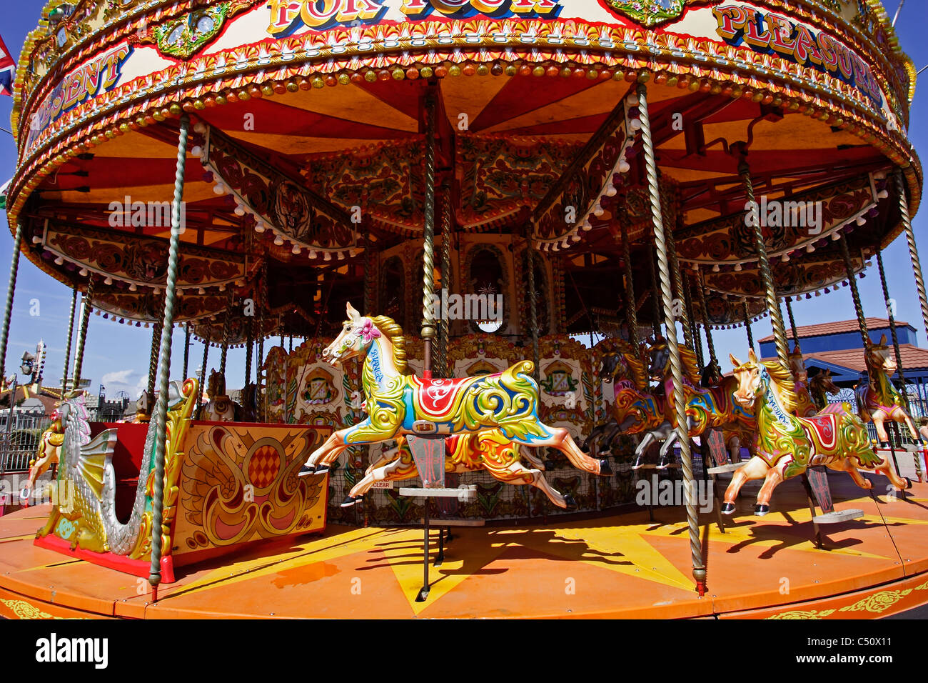 A Carousel on the promenade in the seaside resort town of Rhyl, North ...