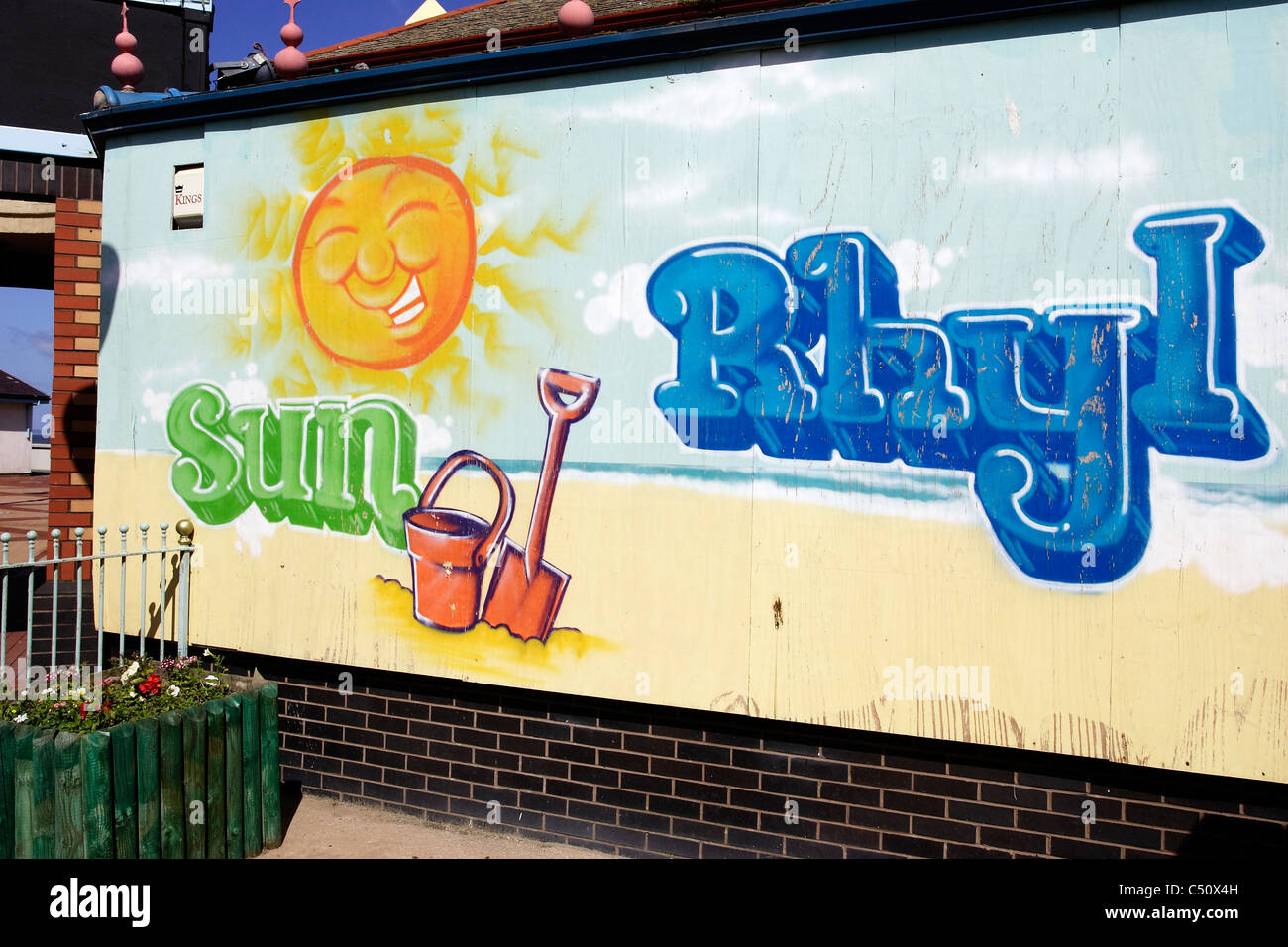 A mural depicting "sunny Rhyl", painted on a wall on the promenade in ...