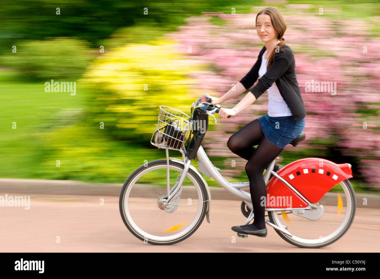 Girl riding a bike Stock Photo - Alamy