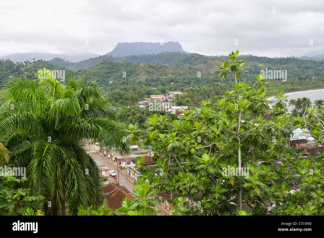 Downtown view of Baracoa, El Yunque Mountain in the background, Cuba ...