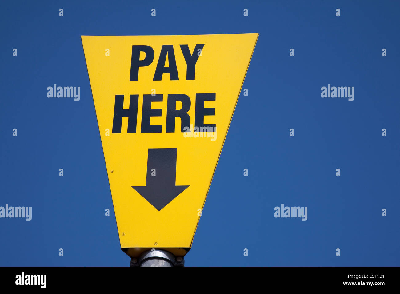 Yellow Payment Sign against Blue Sky Background Stock Photo - Alamy