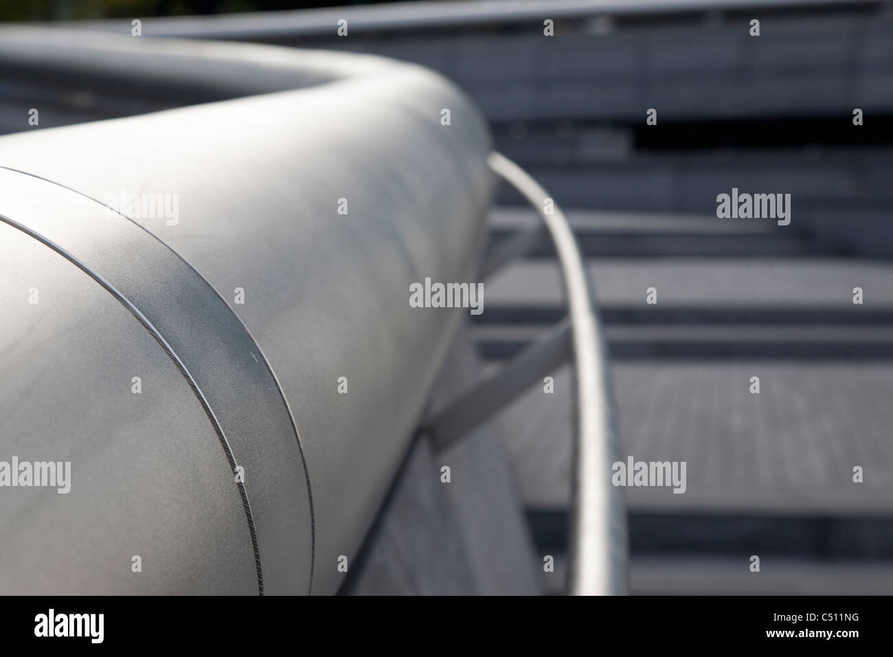 Metal Curve Railing in Urban Setting Stock Photo - Alamy