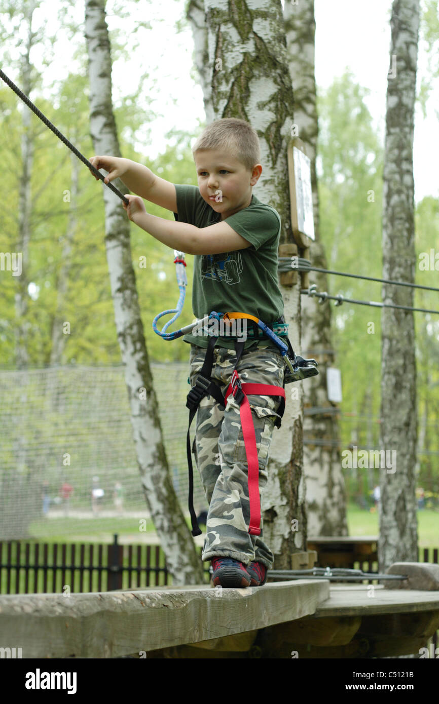 Boy climbing up hill hi-res stock photography and images - Alamy