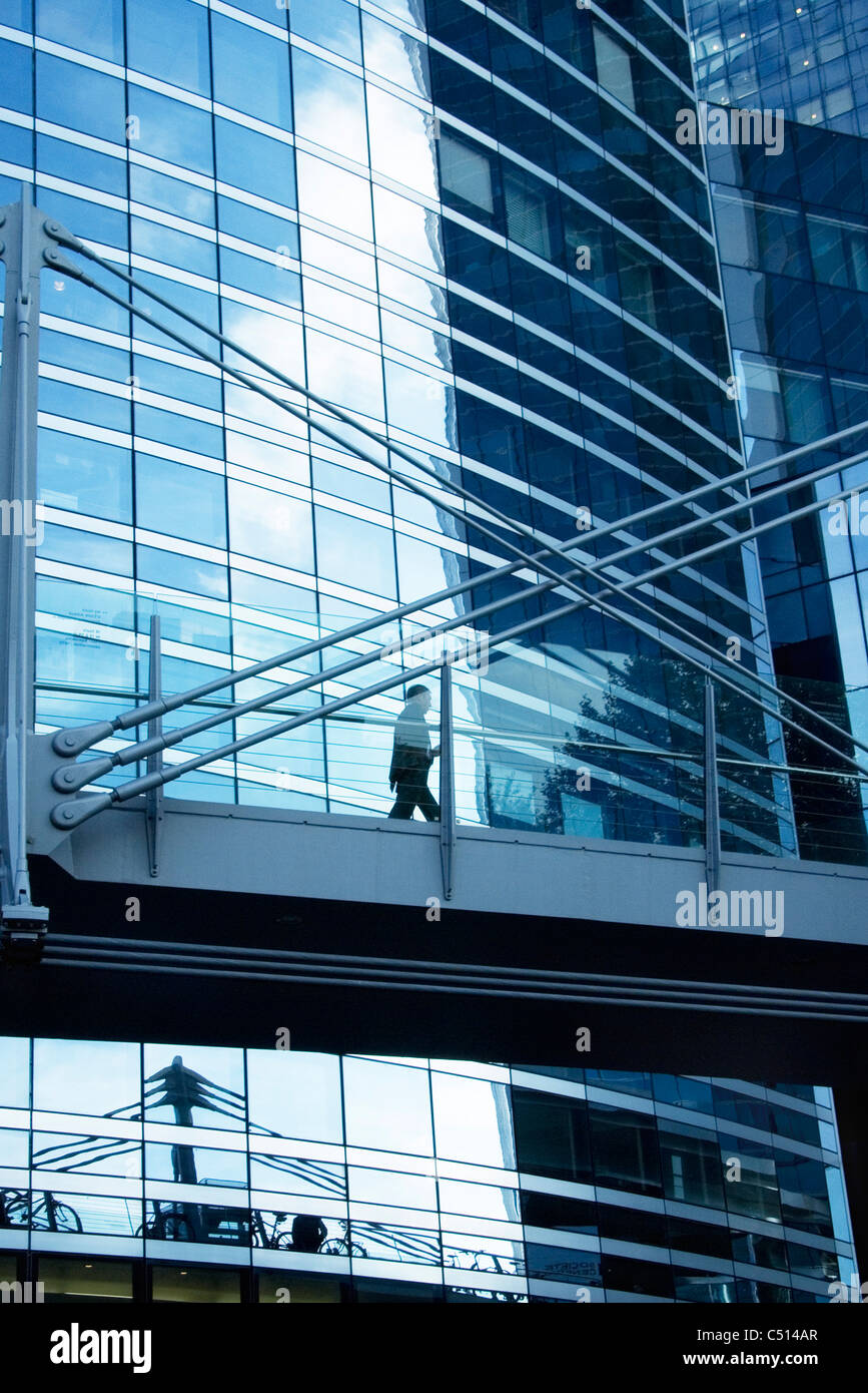 Elevated walkway in front of modern office building Stock Photo - Alamy