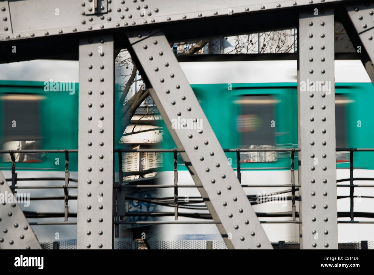 Bridge and passing train Stock Photo - Alamy