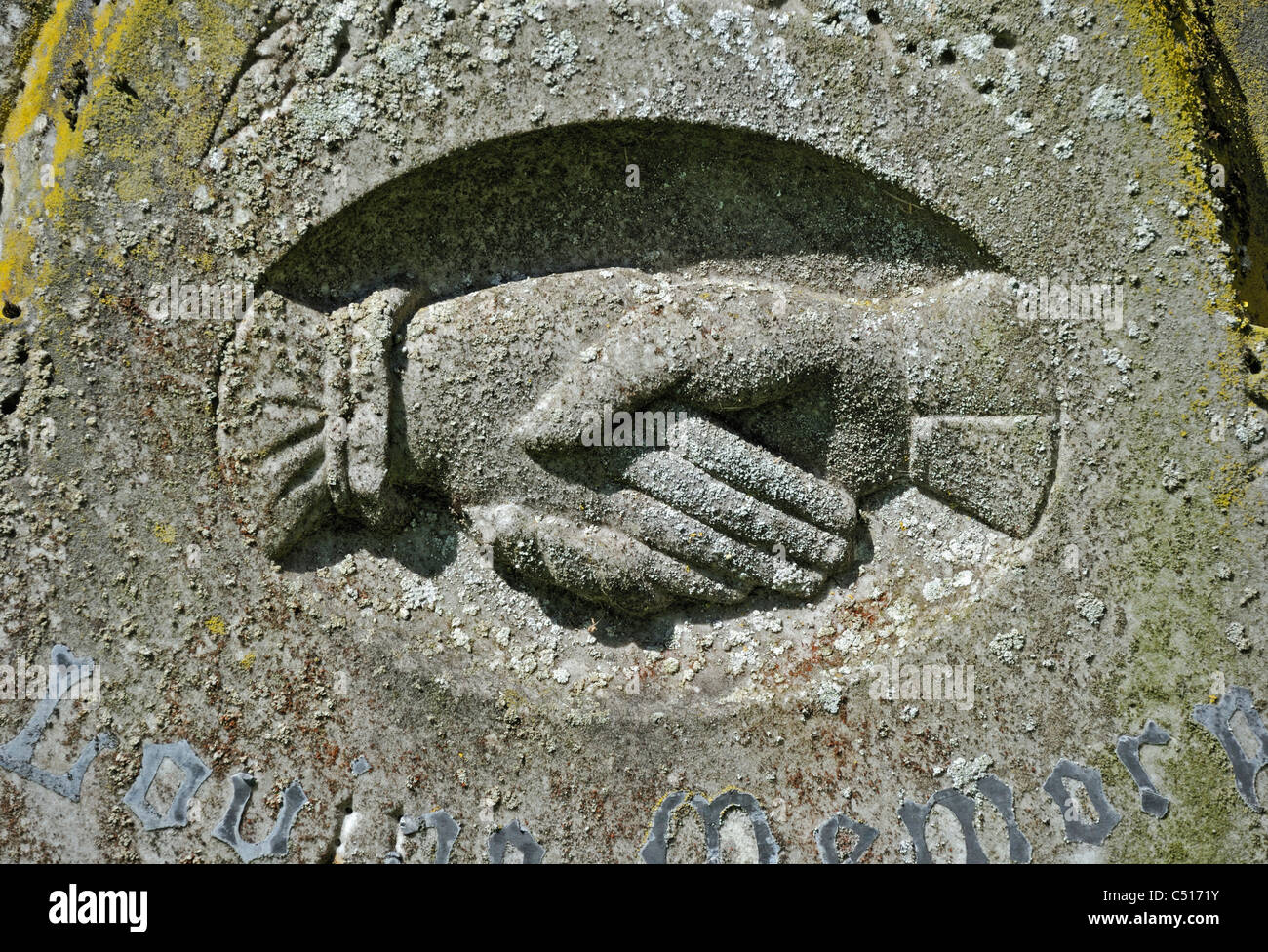 Detail of gravestone with handshake design. Church of Saint Michael ...