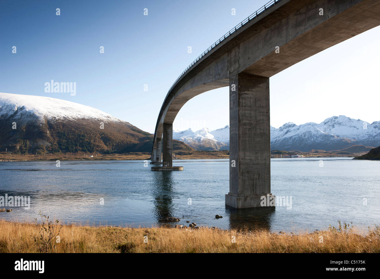 Bridge gradually fades away into the distance over a lake and towards ...