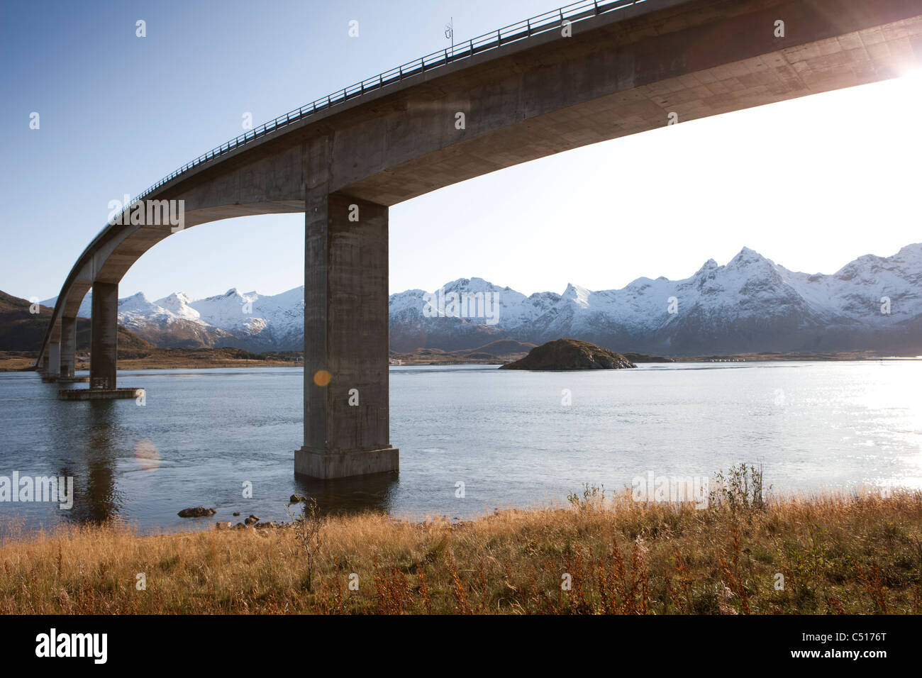 Bridge gradually fades away into the distance over a lake and towards ...