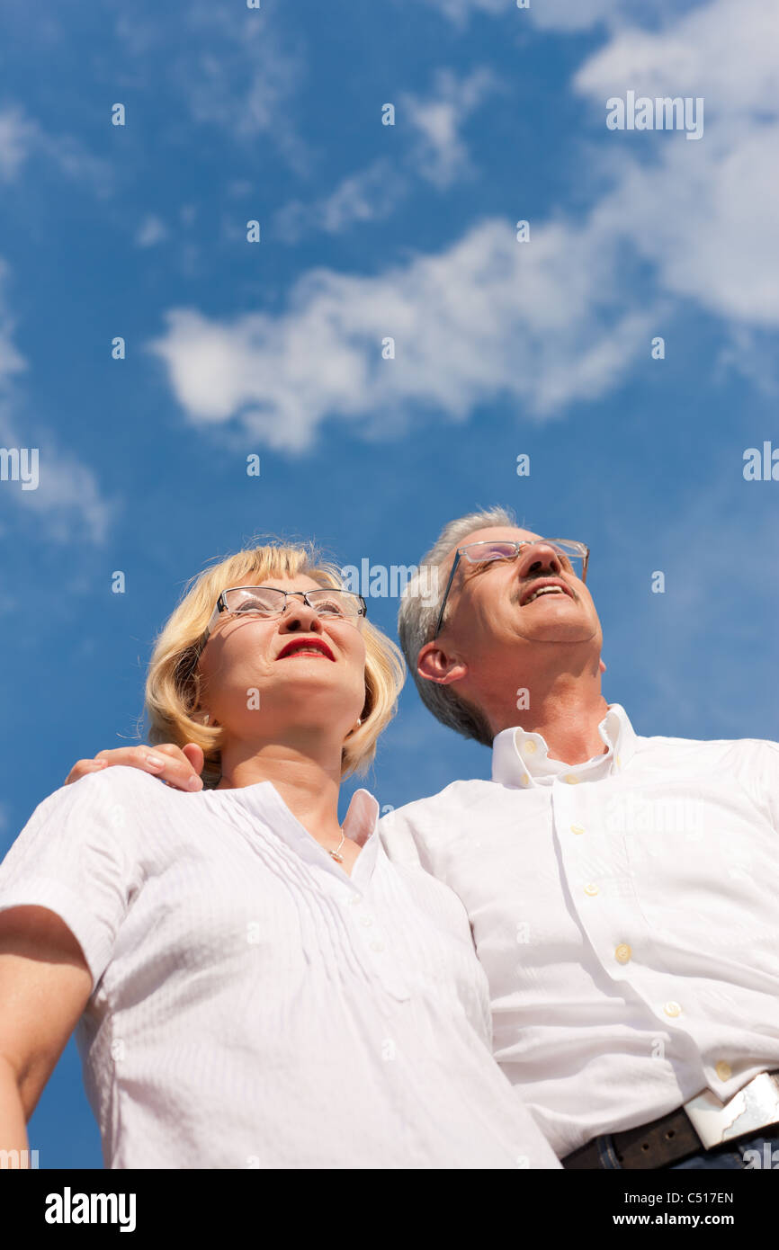 Happy mature couple - senior people, man and woman, already retired ...