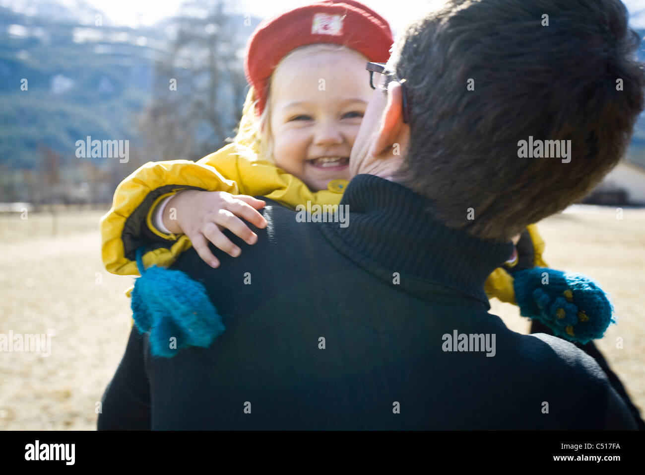 Man carrying young girl rear view hi-res stock photography and images ...