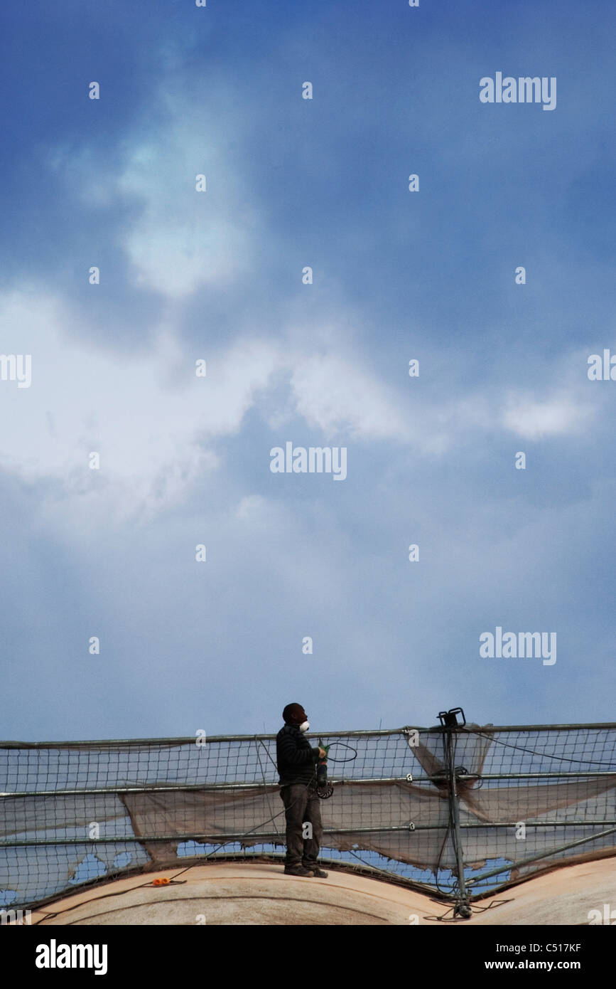 Working holding fence roof architecture hi-res stock photography and ...