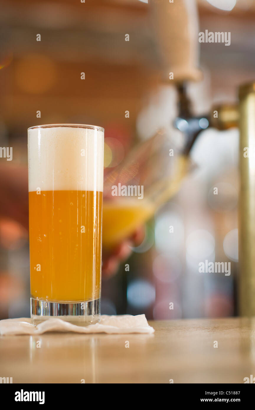 USA, New York State, New York City, Pint of beer on bar counter Stock ...