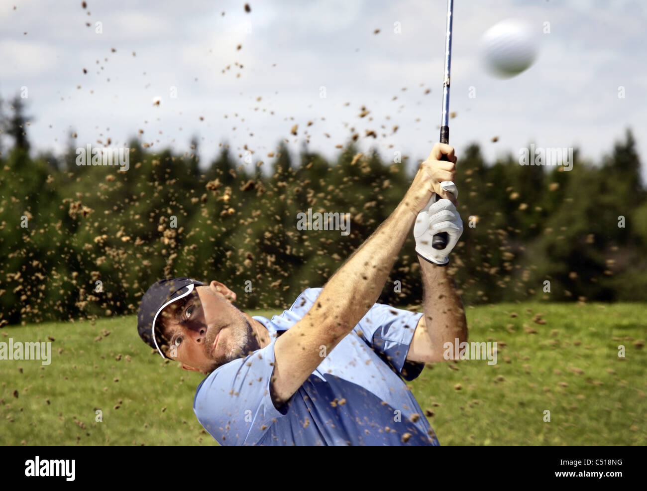golfer shooting a golf ball Stock Photo - Alamy
