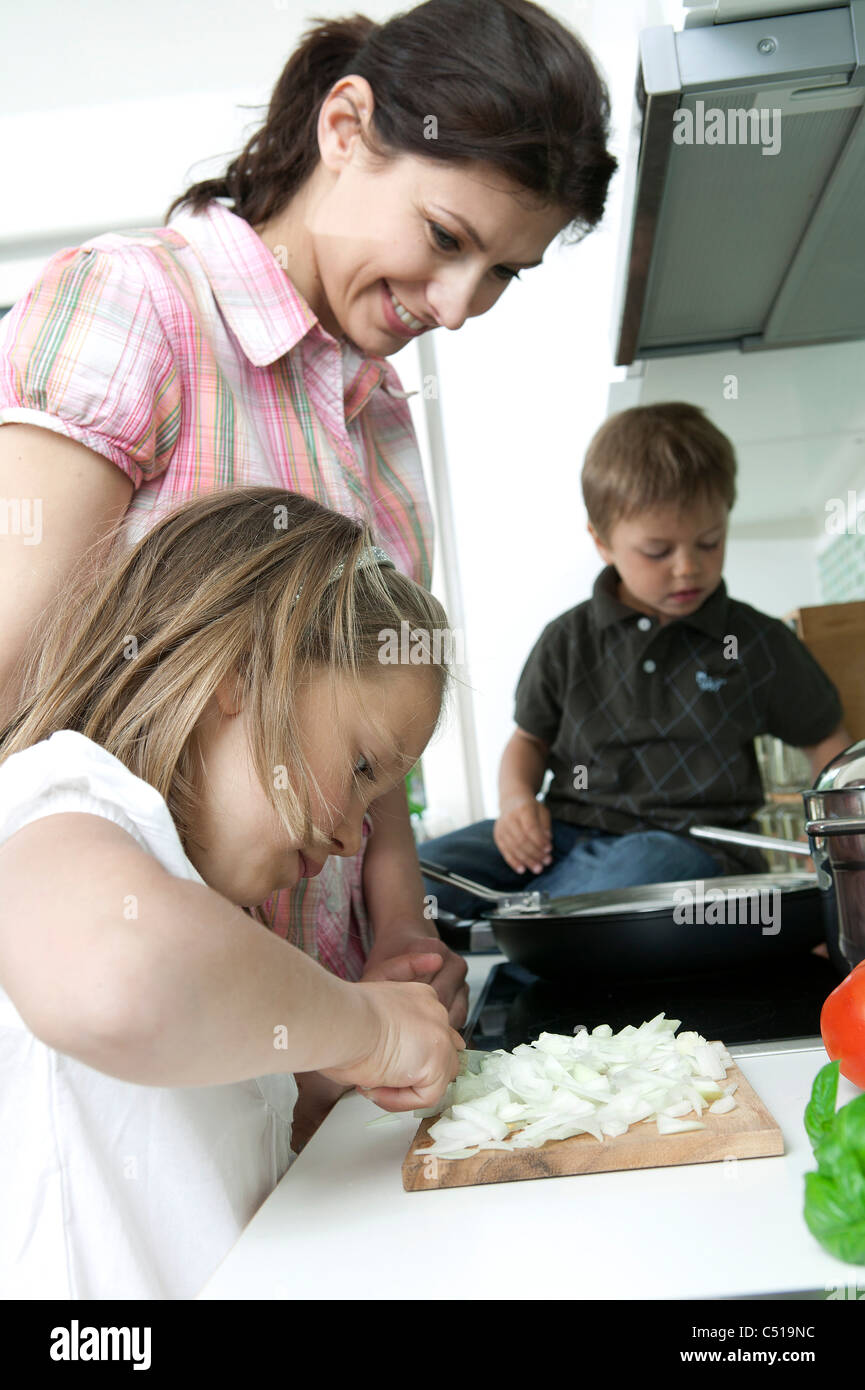 mother cooking with her children Stock Photo - Alamy