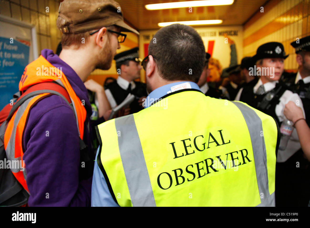 Legal observer at a demonstration notes how people are treated by ...