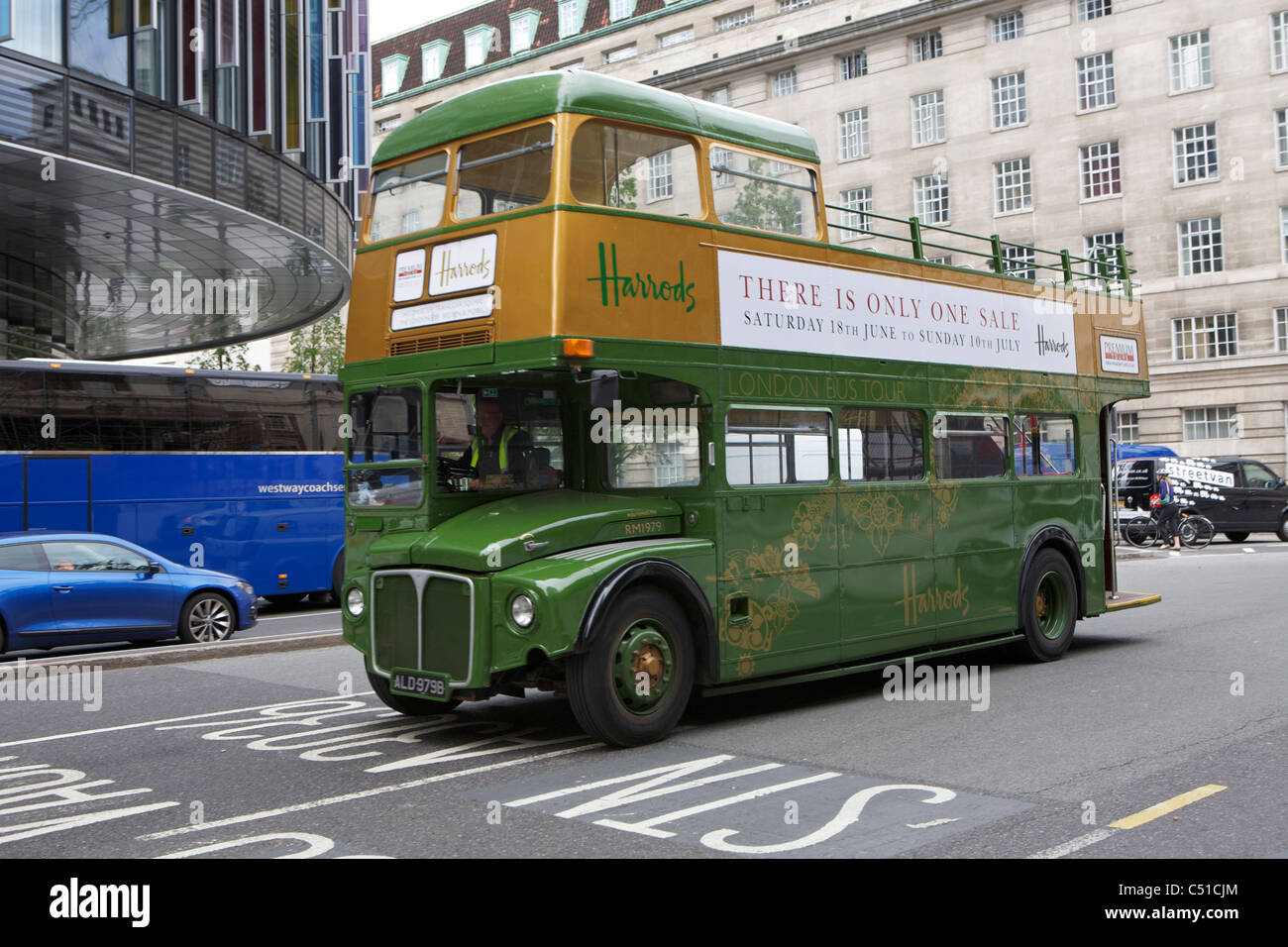 The Harrods green bus in waterloo, London, UK Stock Photo - Alamy