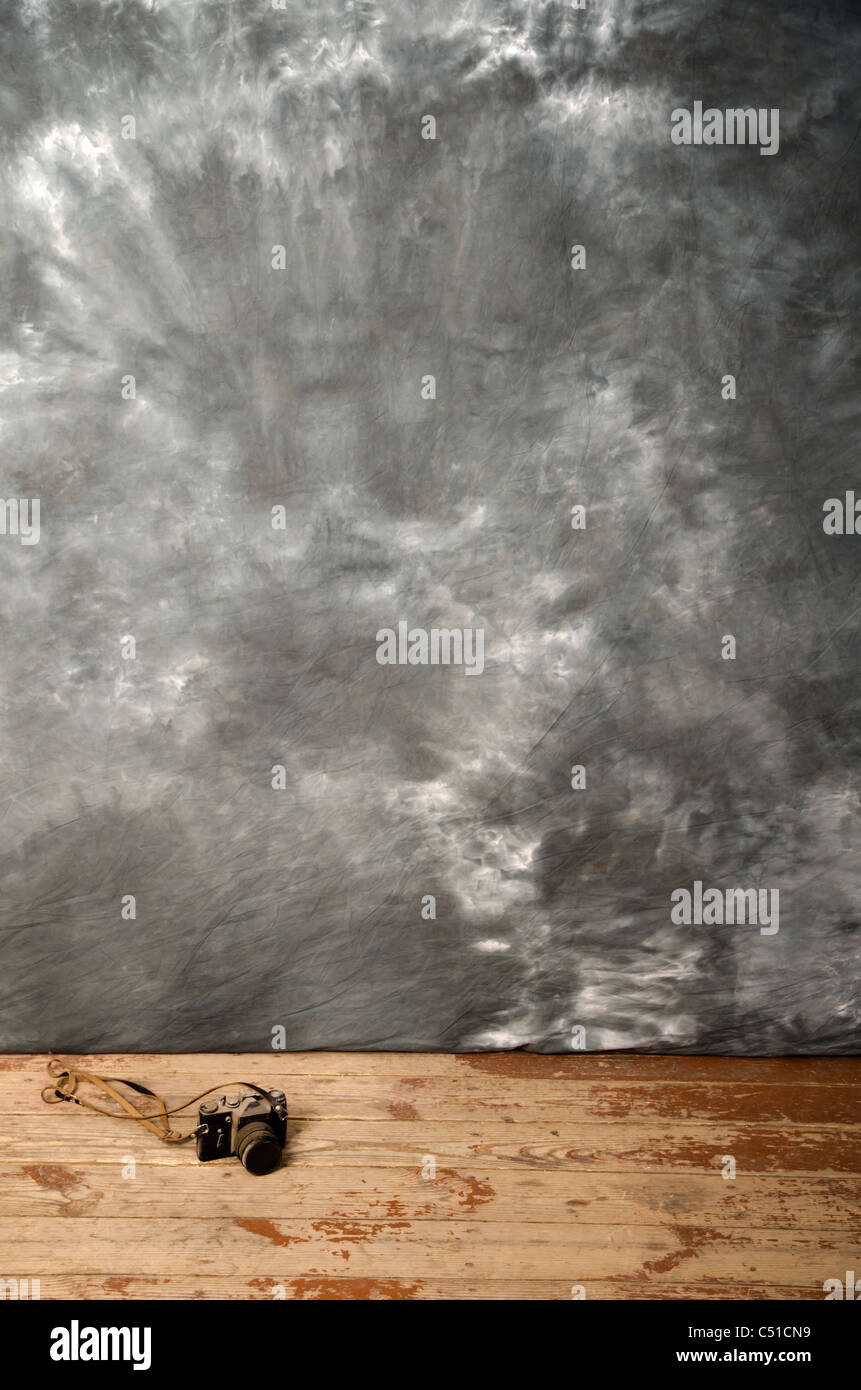 Studio background and ancient photo camera on the wooden floor Stock ...
