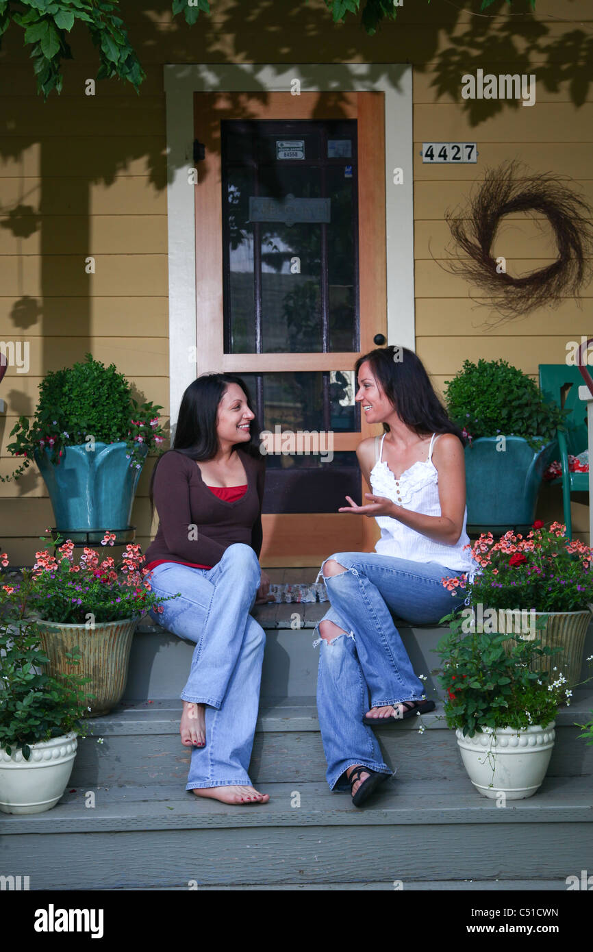 Two women sit on porch hi-res stock photography and images - Alamy
