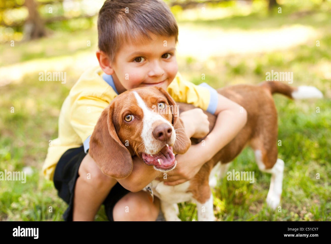 Portrait of Boy with Dog Stock Photo - Alamy