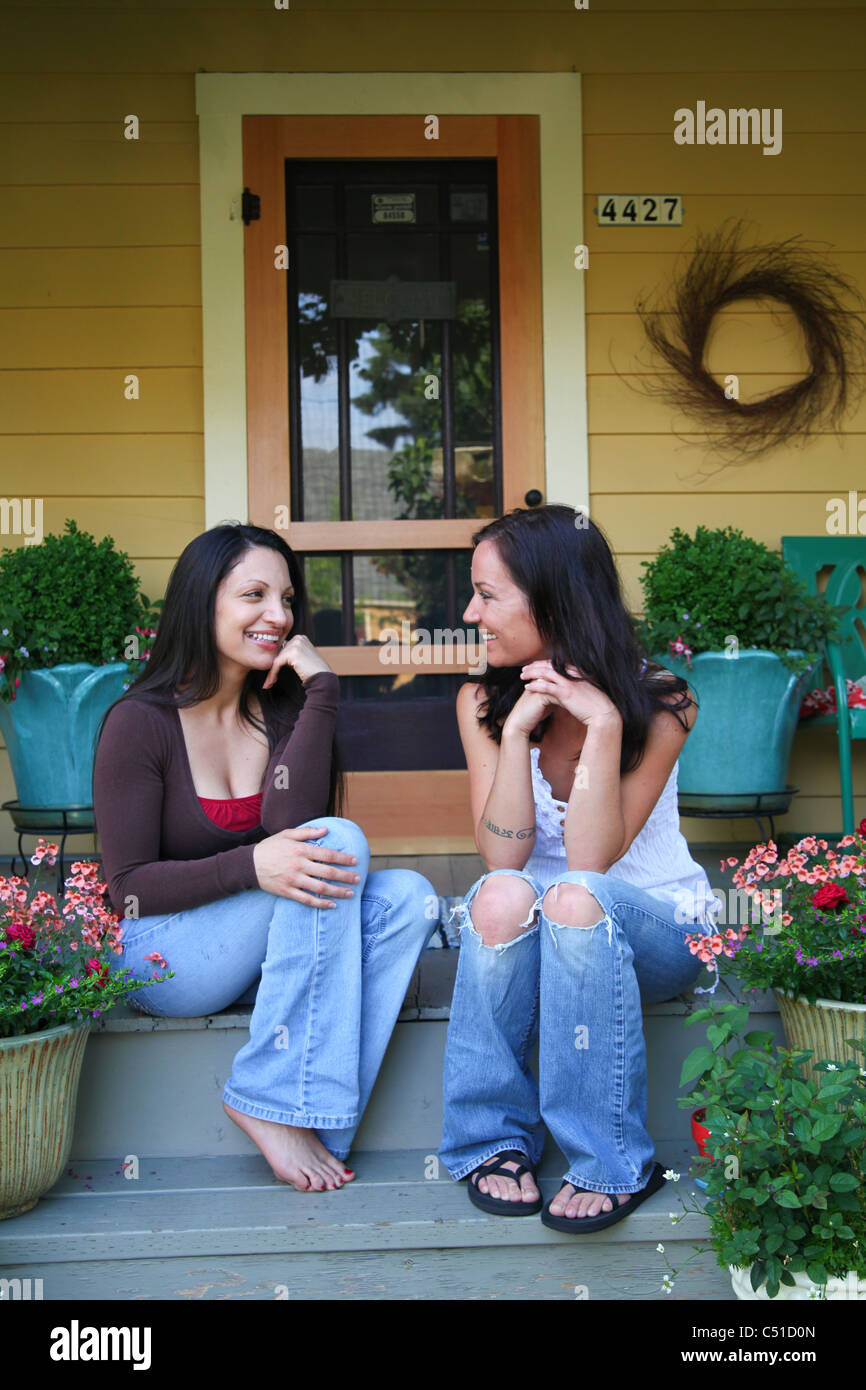 Two women sit on porch hi-res stock photography and images - Alamy