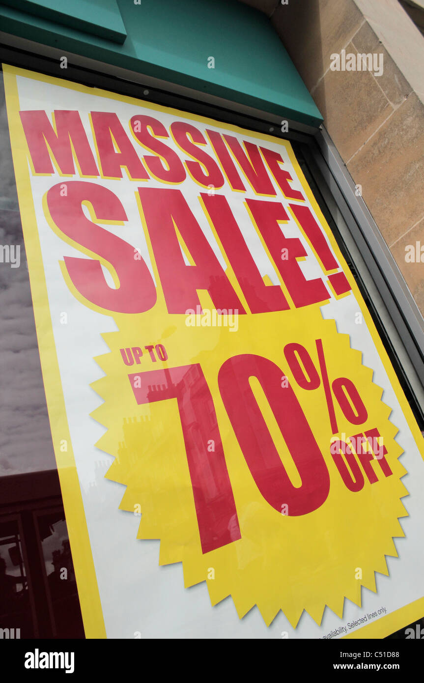 Sale sign in shop window Stock Photo - Alamy