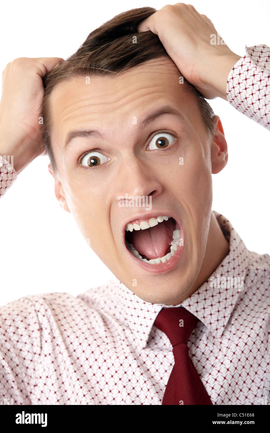 A businessman in trouble screaming on white background Stock Photo - Alamy