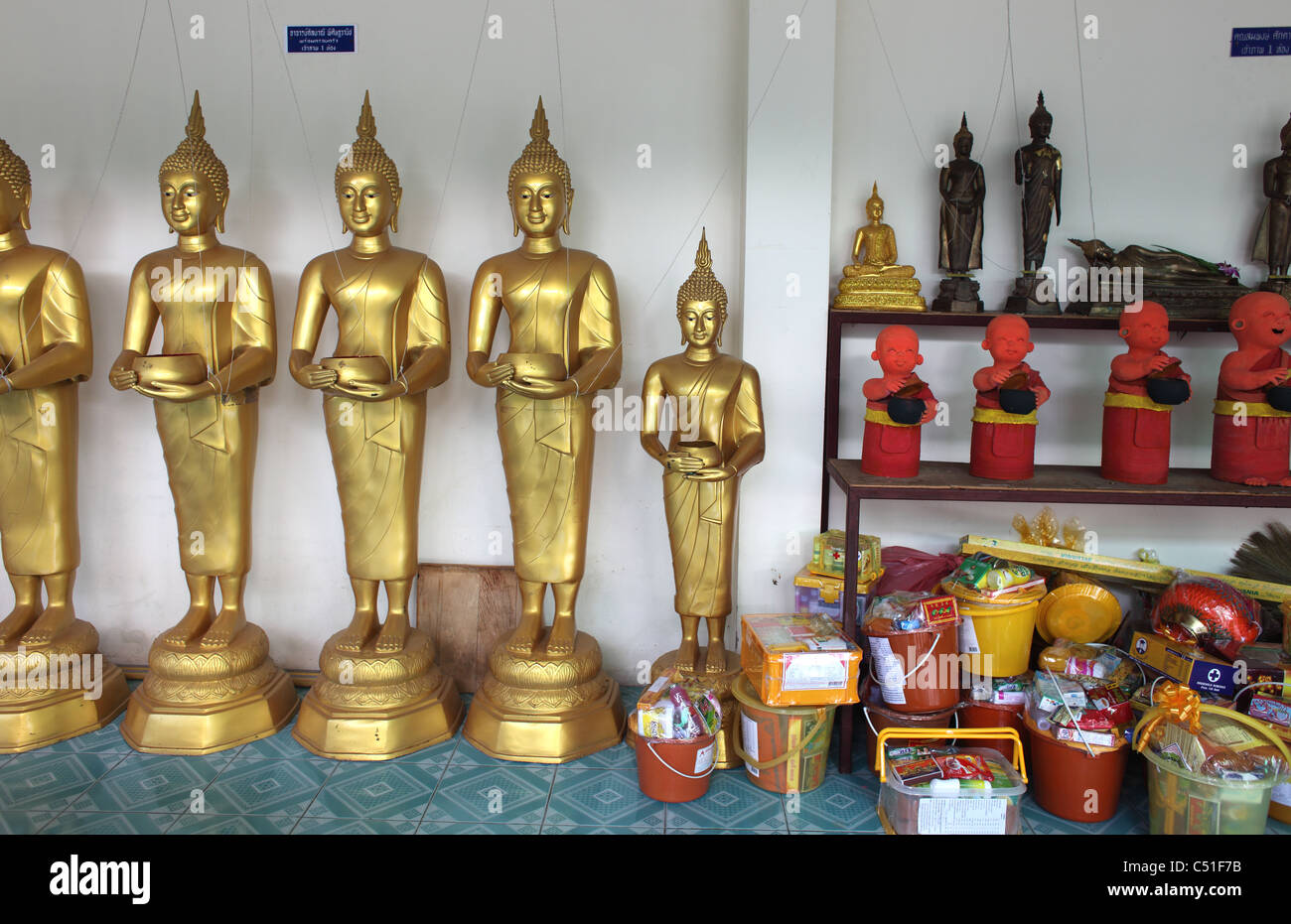 Buddhist offering buckets hi-res stock photography and images - Alamy
