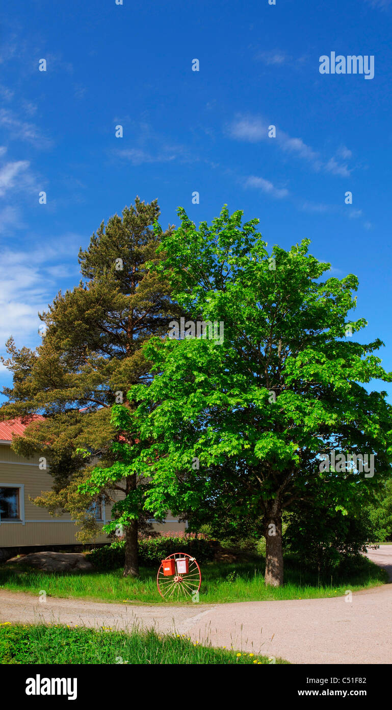 Scandinavia Finland finnish red letter box mailbox Stock Photo - Alamy