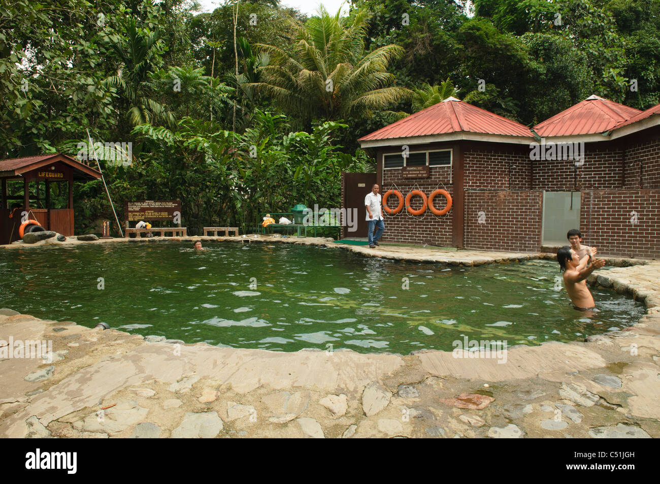 bathers enjoy the Poring Hot Springs in Sabah, Borneo, Malaysia Stock ...