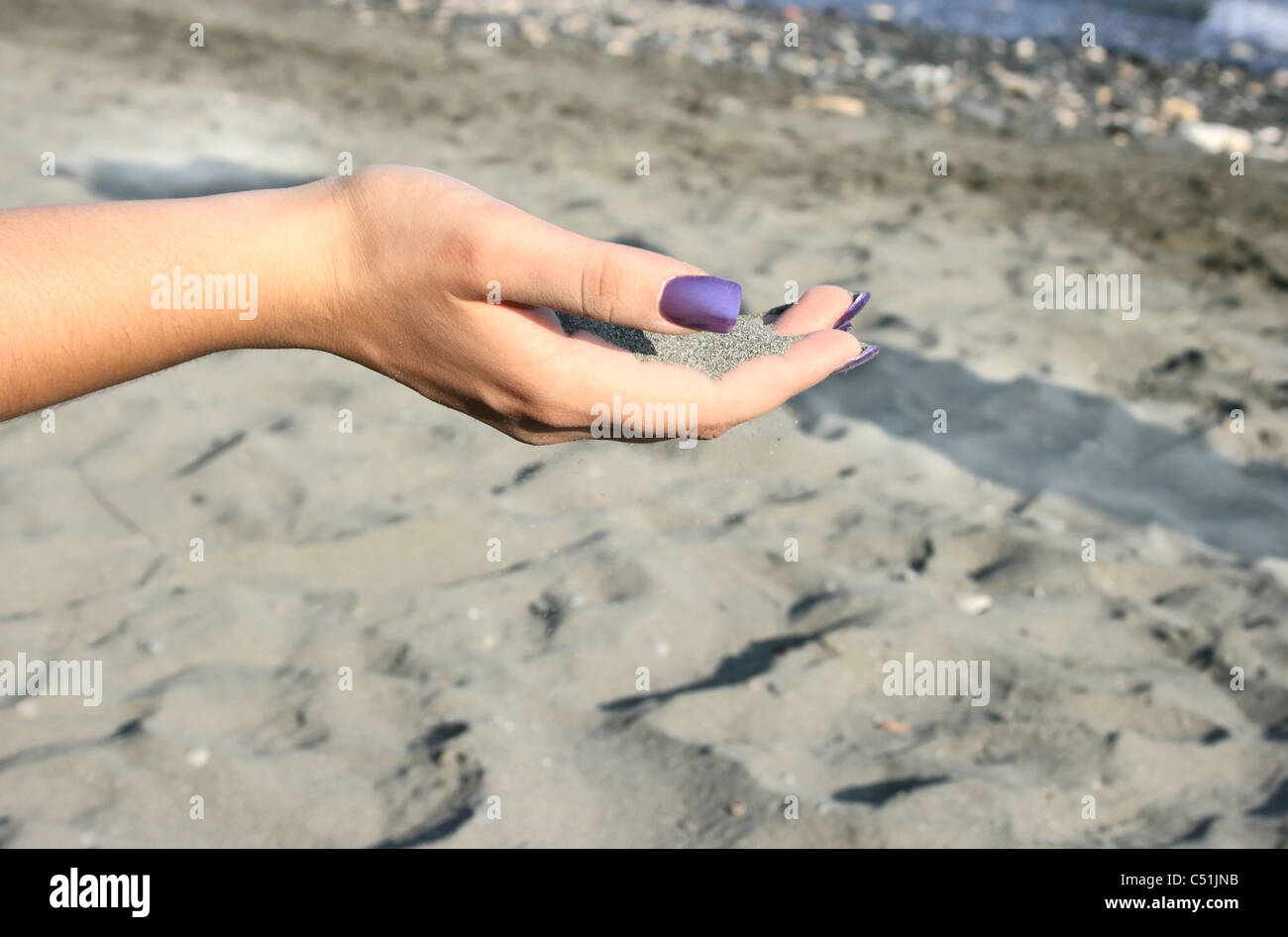 Sand Falling From Hand High Resolution Stock Photography and Images - Alamy