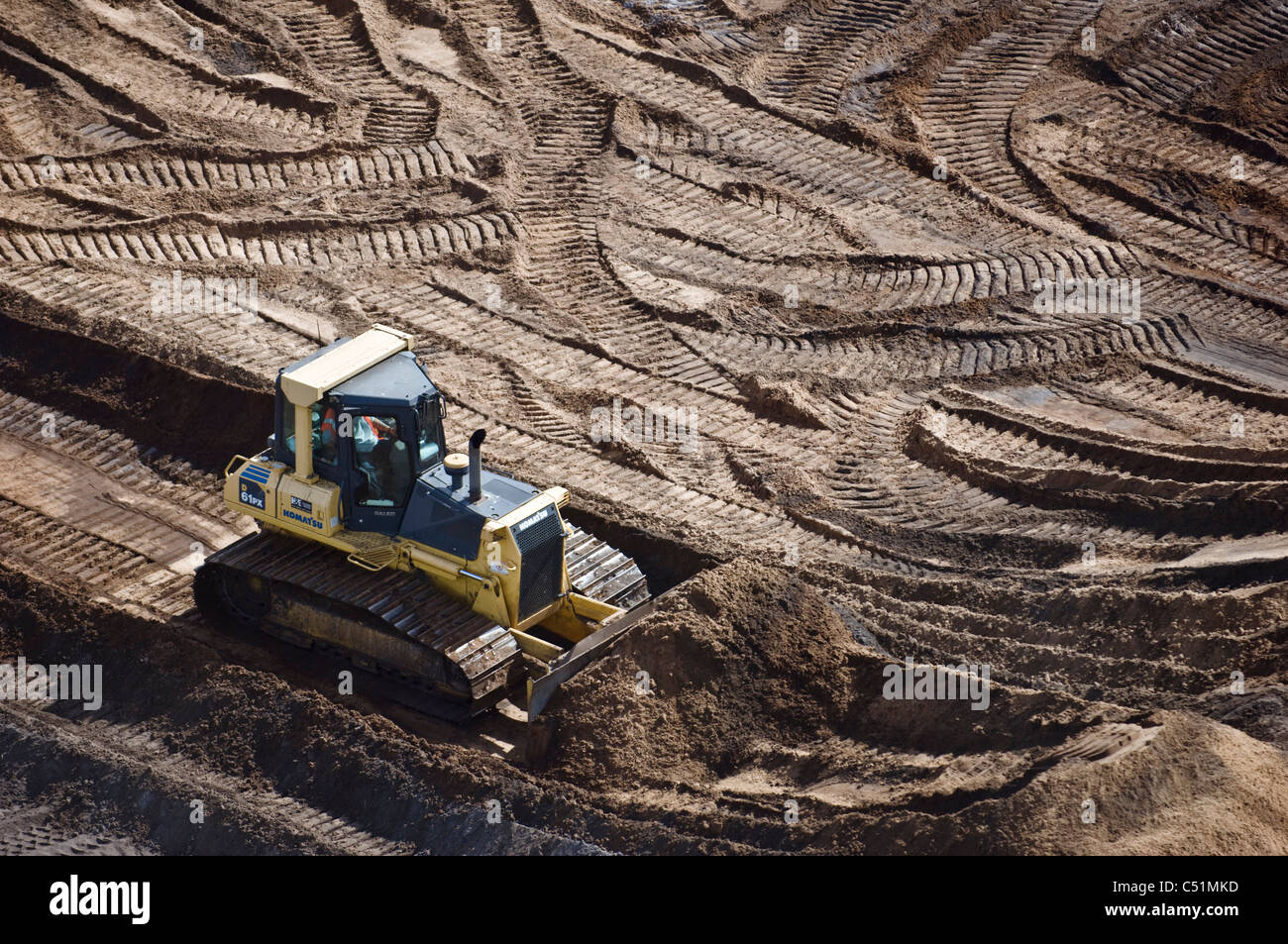 Machine pushing earth hi-res stock photography and images - Alamy