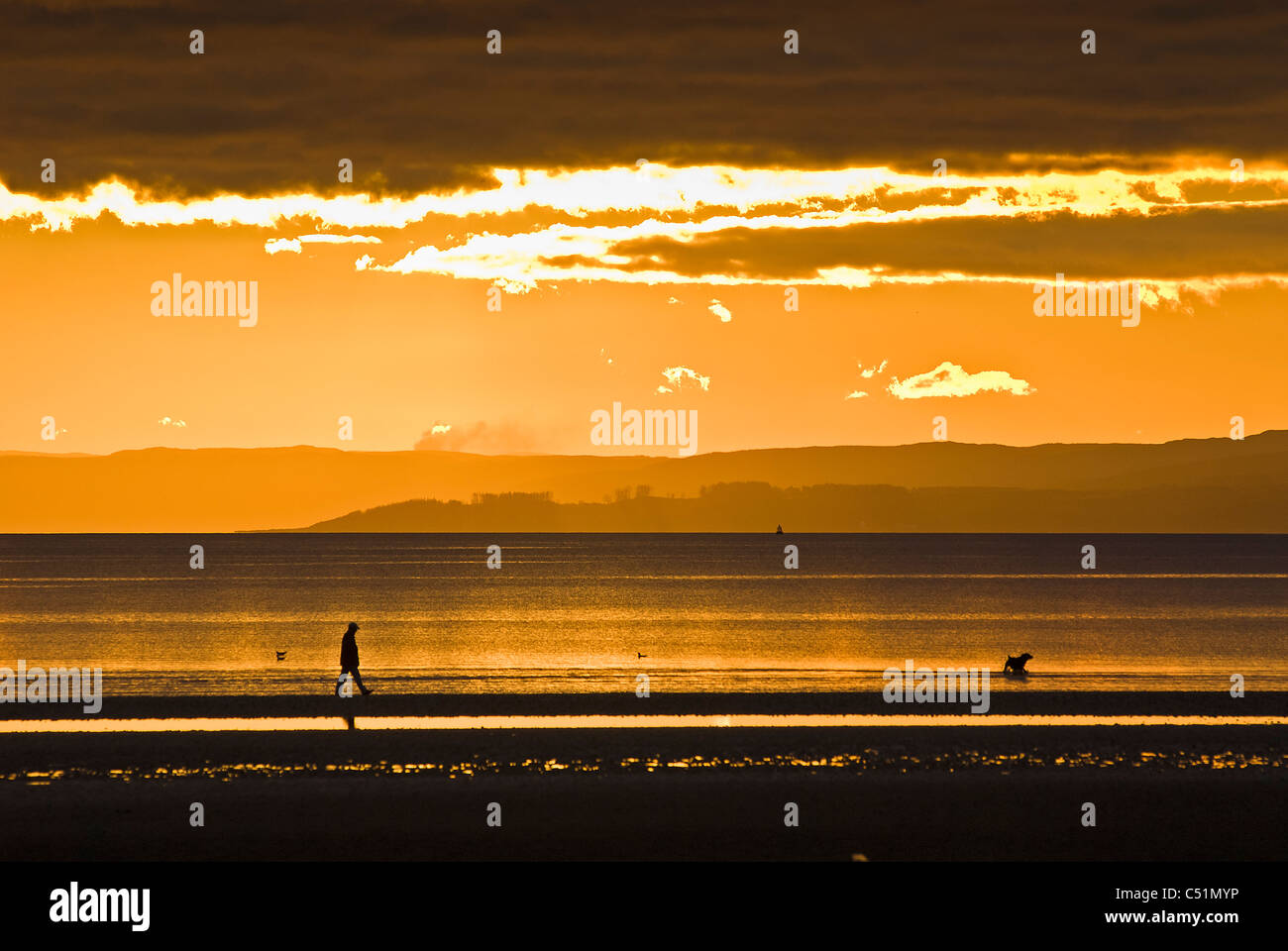 The beach at Ettrick Bay, Isle of Bute, Argyll, Scotland looking over ...