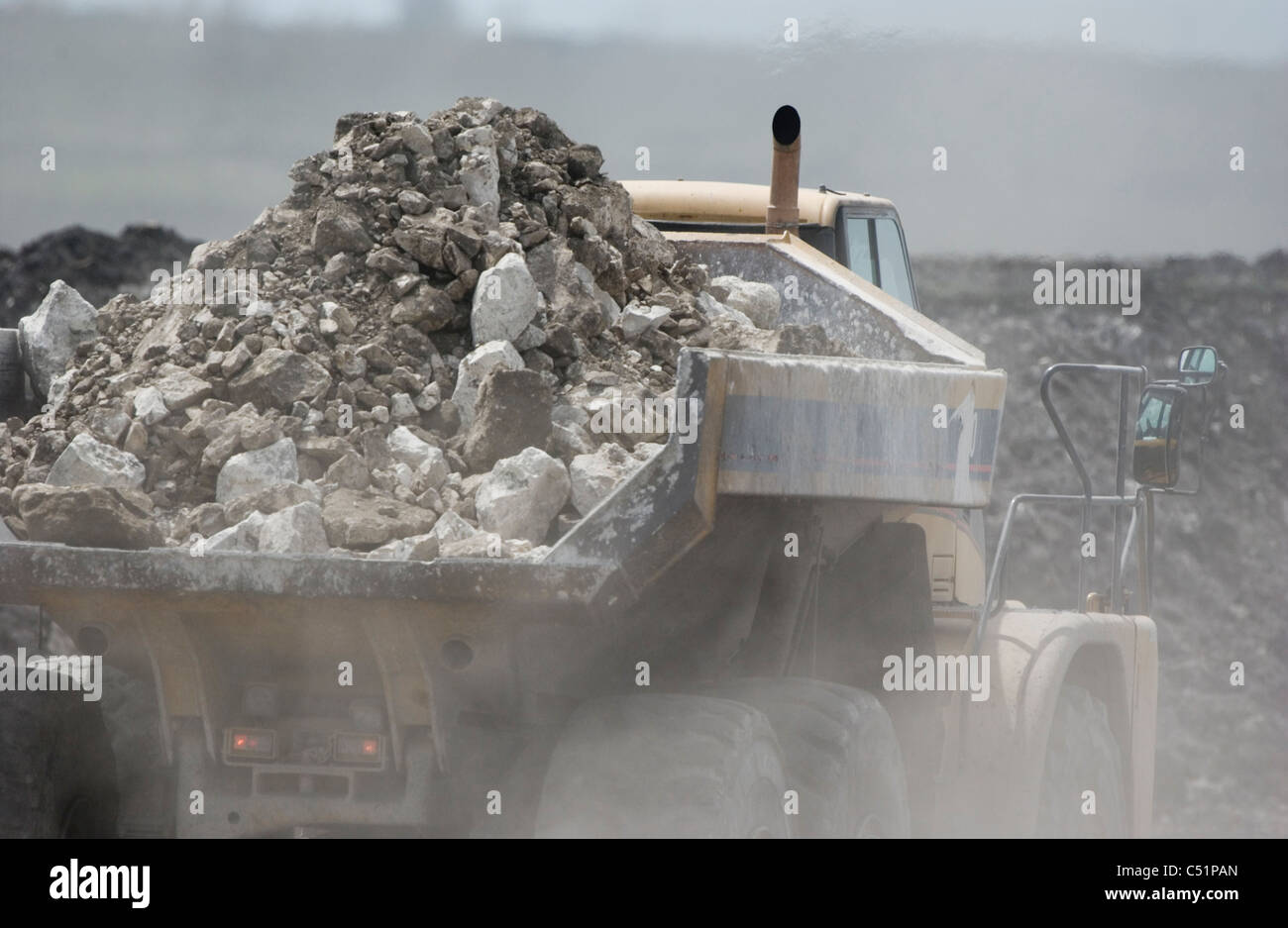 Dump truck hauling hi-res stock photography and images - Alamy