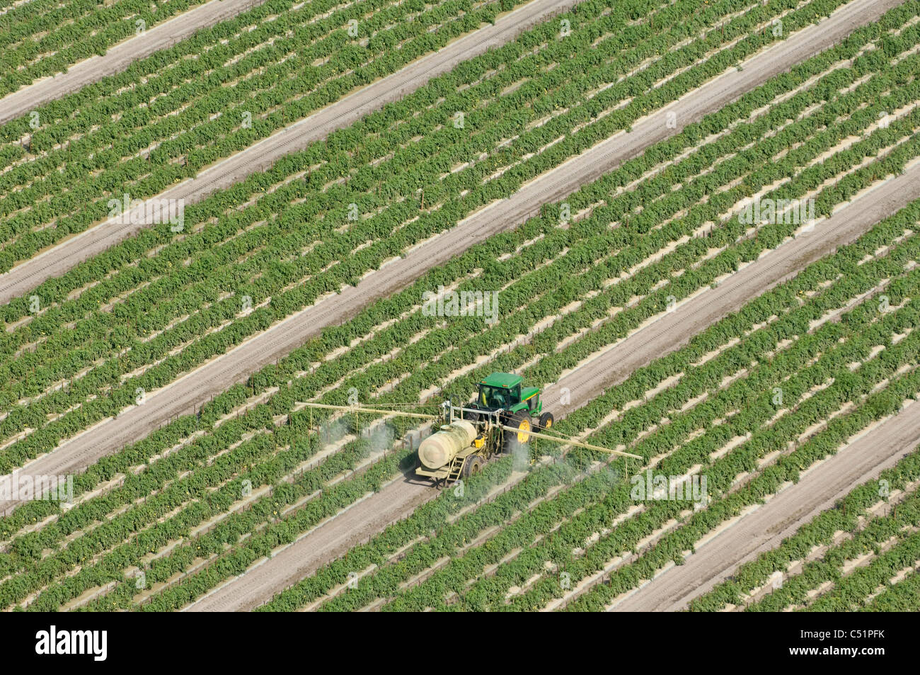 Agricultural Area farming spraying pesticide Stock Photo - Alamy