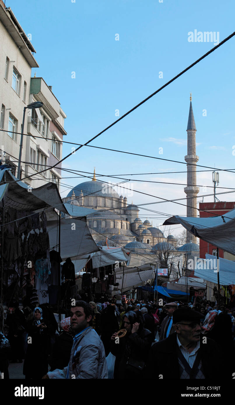 Turkey Istanbul busy open market with Islamic mosque at the back Stock ...