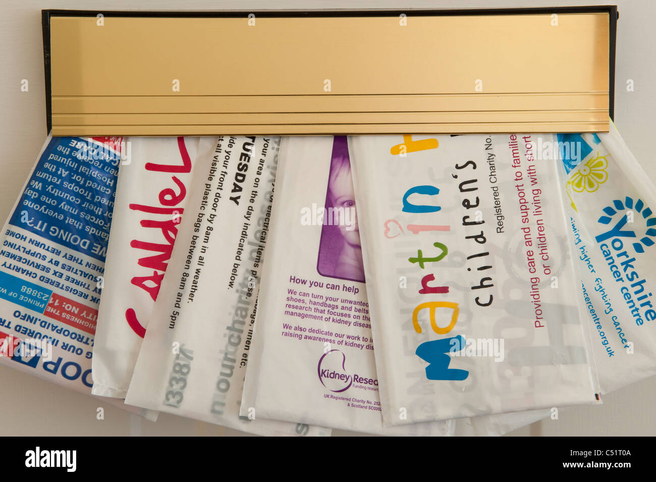 Charity bags (clothes collection fundraiser) posted through door ...