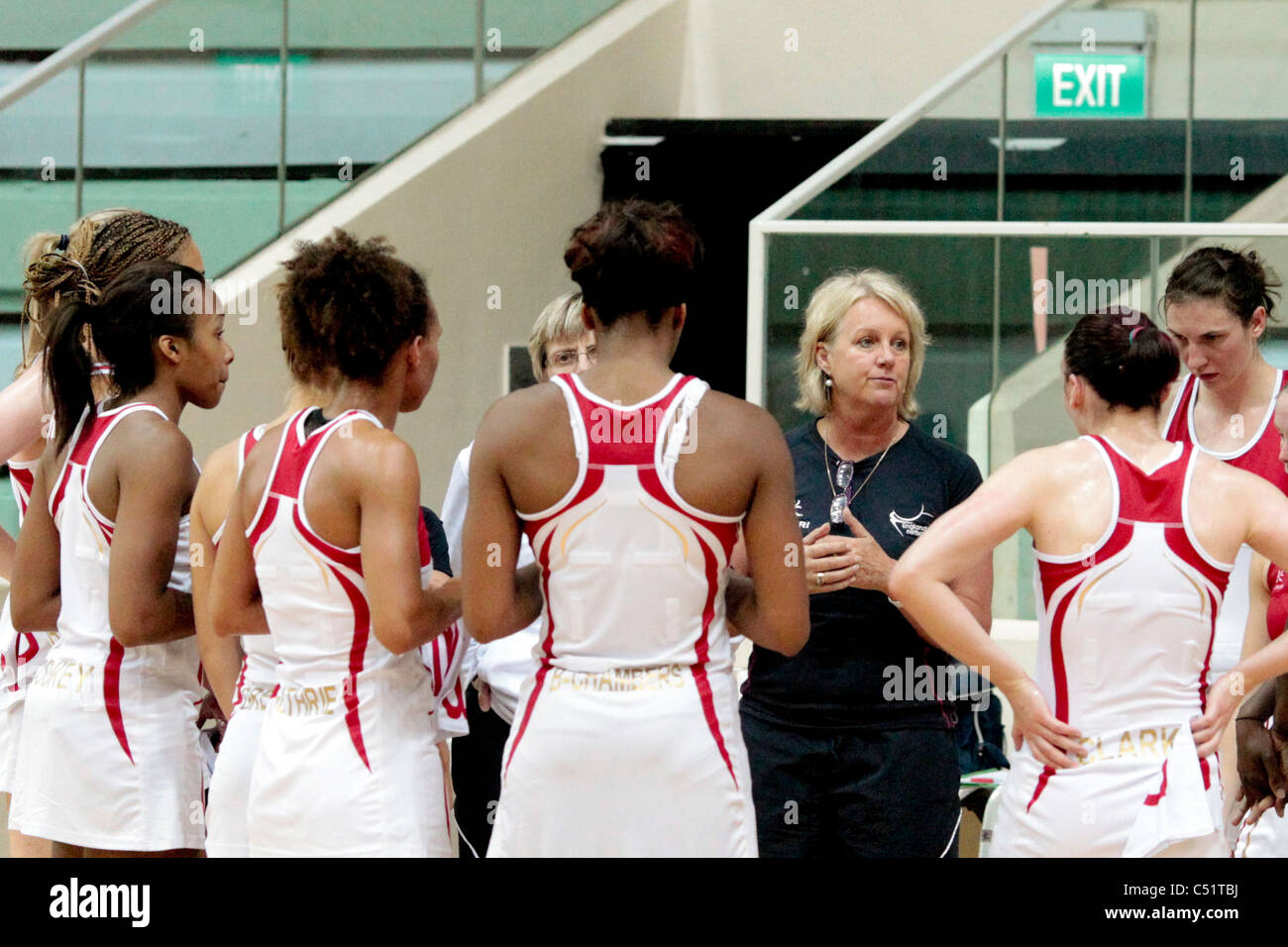 England coach Sue Hawkins(black) talks to the English team after their ...