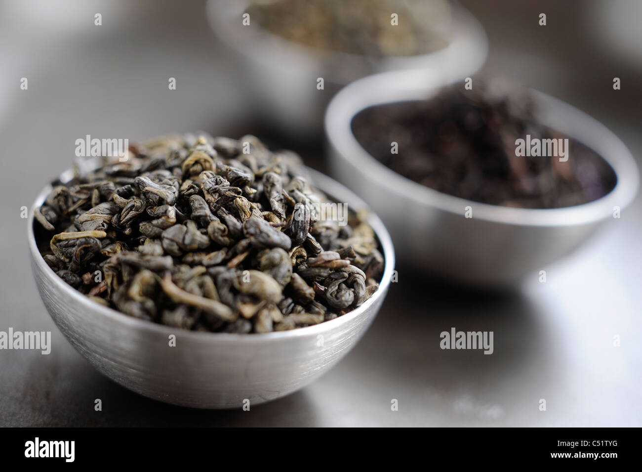 Selection of loose leaf teas in small bowls Stock Photo - Alamy