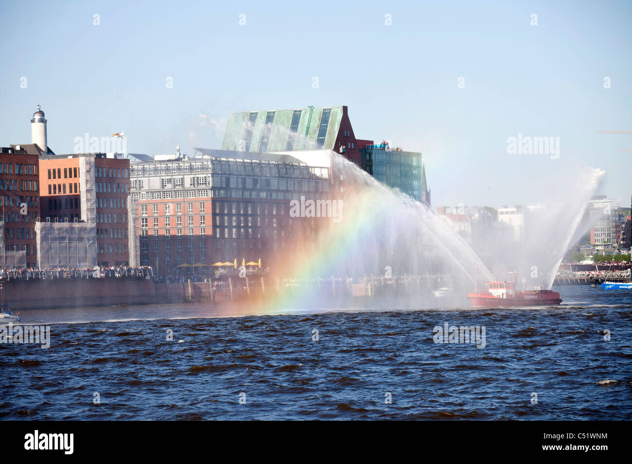 Fire boat spouting water in all directions, Hafengeburtstag or Port ...